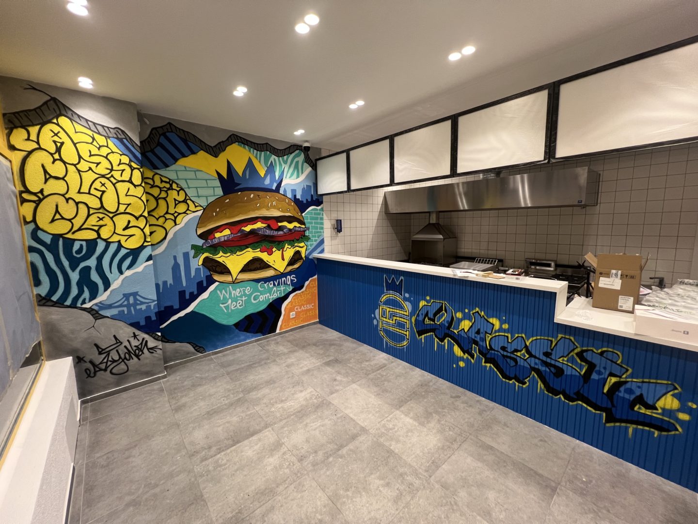 Une Fresque Murale Sur-Mesure pour le Fast-Food Classic à Lausanne : Un Voyage entre Art Urbain ...